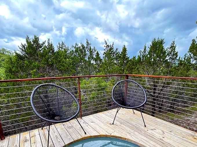 Two woven chairs on a wooden deck, a sky full of drama above. Nature put on its best outfit today.