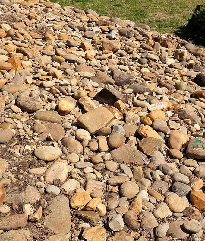 A river of smooth stones winding through the park, each one quietly minding its own beautiful business.