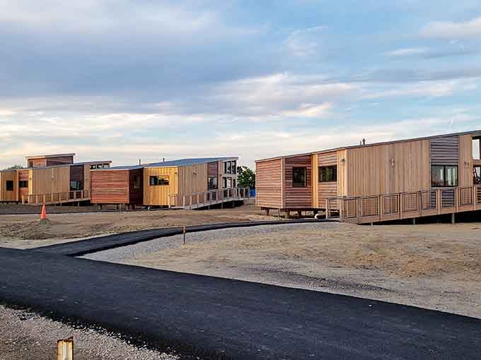 These modern wooden cabins mean you can sleep near the bay without actually sleeping on the ground. Progress.