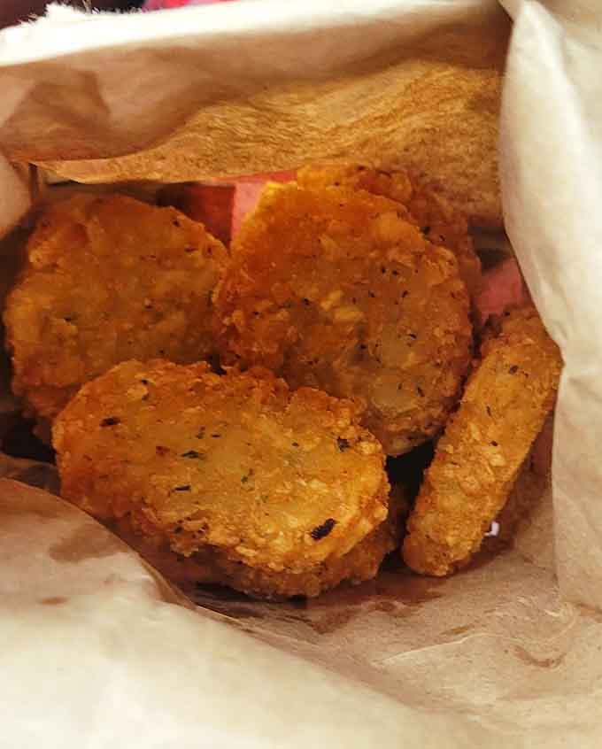 Crispy, golden potato cakes that prove Hinkle's side game is just as serious as its burger reputation.