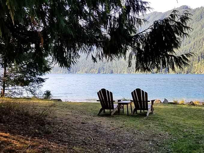 Two Adirondack chairs, a shimmering lake, and forest-covered mountains beyond &mdash; some views simply refuse to be ignored.