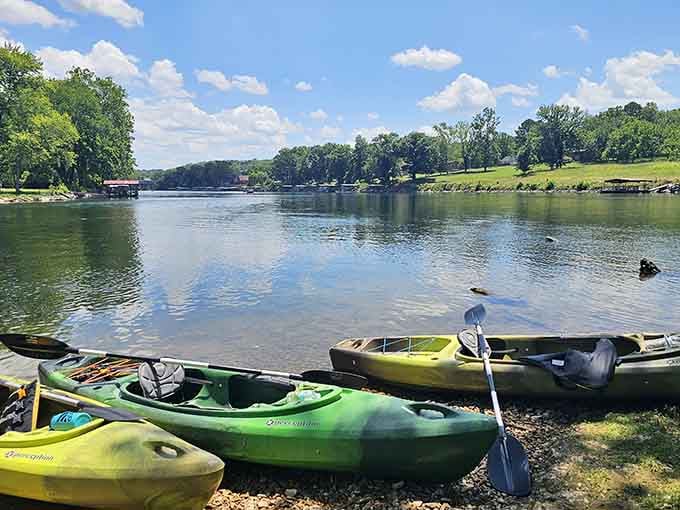 Kayaks lined up along the White River, ready to take you somewhere quieter and considerably more peaceful.
