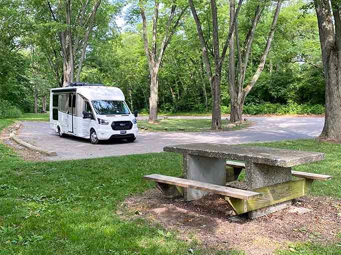 A concrete picnic table under the trees. Simple, honest, and somehow exactly right for this place.