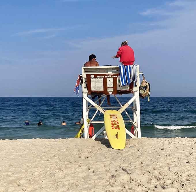 Lifeguard stands watch over swimmers, providing safety without sacrificing the park's wonderfully undeveloped character and charm.