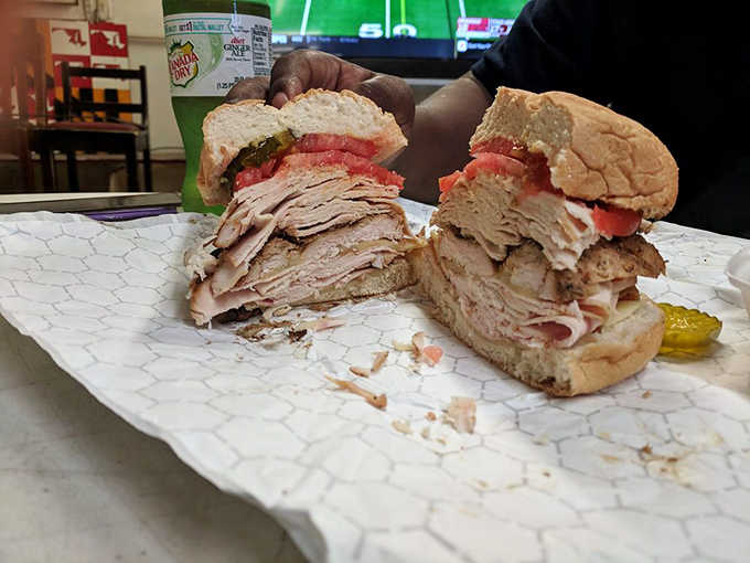 Layers of smoked turkey stacked so high the bun is barely keeping things together, and nobody minds.