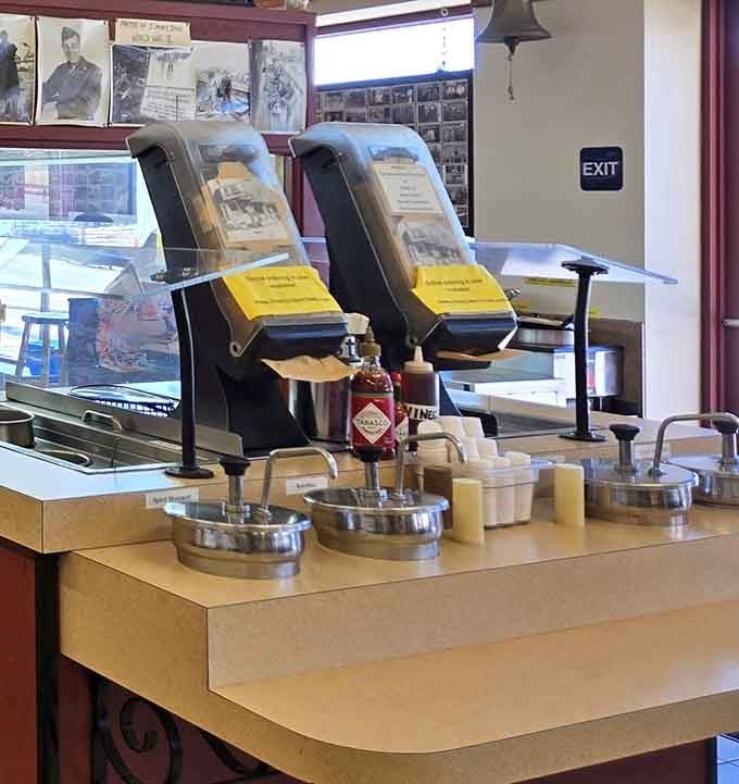 Old-school condiment dispensers ready to customize your meal exactly how you like it, no judgment included.