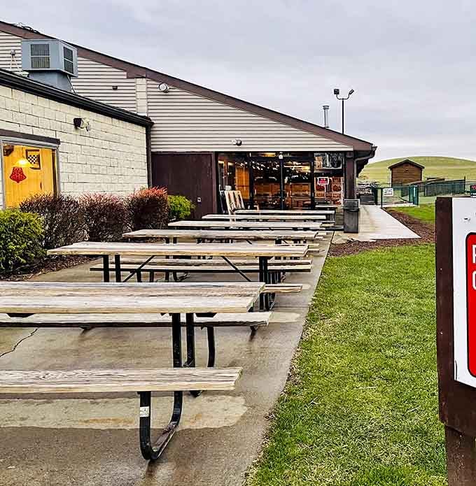 Picnic tables lined up outside mean your post-tubing recovery comes with fresh air and good company included.