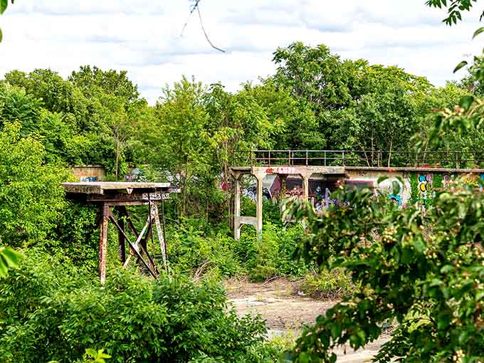 From a distance, the graffiti-covered walls peek through the greenery like a secret waiting to be discovered.