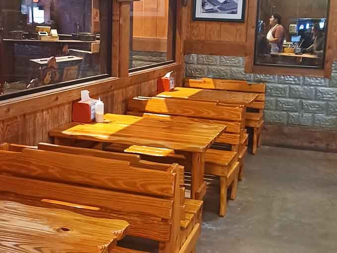 Warm pine benches polished smooth by decades of happy diners. These seats have witnessed more great meals than most restaurants ever will.