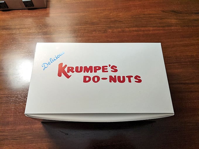 Simple white box with red lettering, proving the best things don't need fancy packaging to shine.