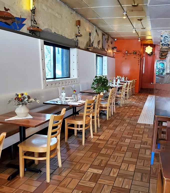 Dining room bathed in natural light with tables waiting for the evening rush of reservation-holders who planned weeks ahead.