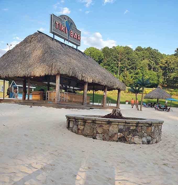 A proper tiki bar, a stone fire pit, and white sand underfoot. Georgia summers just found their headquarters.