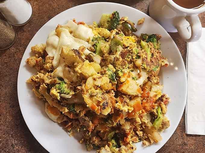 A hearty scramble loaded with broccoli, potatoes, and egg. Proof that breakfast can be both colorful and deeply satisfying.