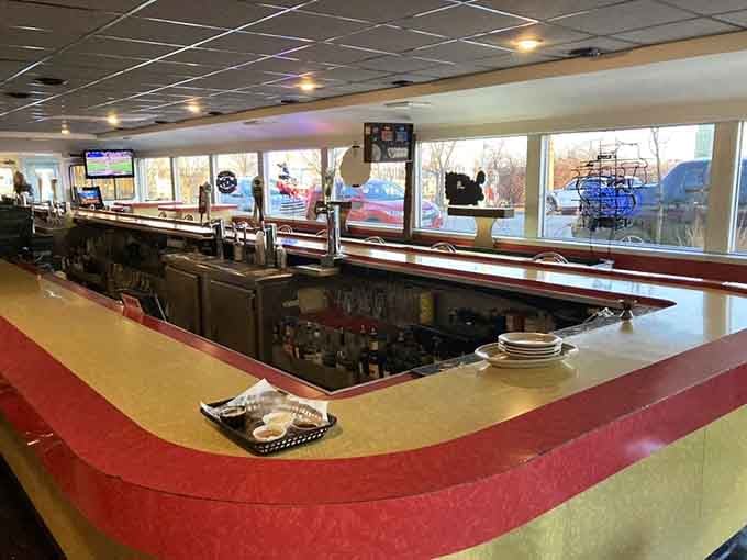 That long, gleaming counter is an open invitation to sit down, order something good, and stay a while.
