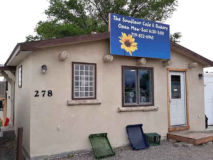 The Sunflour Cafe and Bakery's cheerful sunflower sign is basically a hug in signage form, beckoning you in for something warm and homemade.