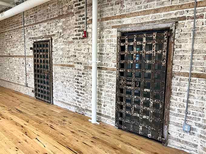 Original iron doors still standing strong, looking like they've seen absolutely everything. They have.