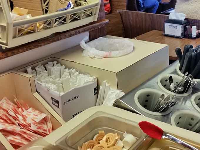 The condiment station is stocked, orderly, and ready for the lunch rush, reflecting the down-home efficiency Pearly's is known for.