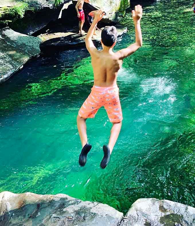 Pure, unfiltered joy, mid-air, above some of the clearest water in New York State.