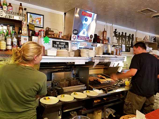 Watching the grill cook work is like front-row seats to a performance where the finale lands on your plate.
