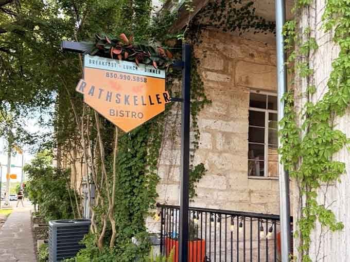 The street-level signage guides hungry travelers down to their next favorite meal in the Hill Country.