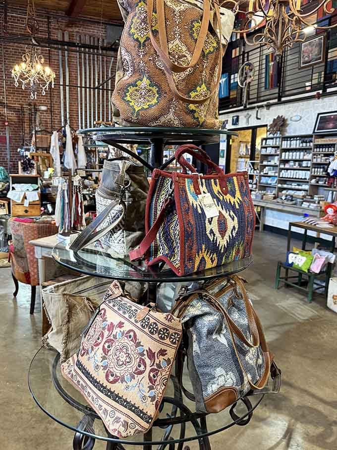 Bohemian and Western-style tote bags stacked on a tiered display, each one practically daring you to take it on an adventure.