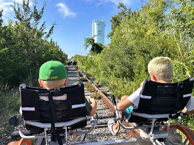Two young adventurers ride toward the Cape May water tower, already living their best summer story.