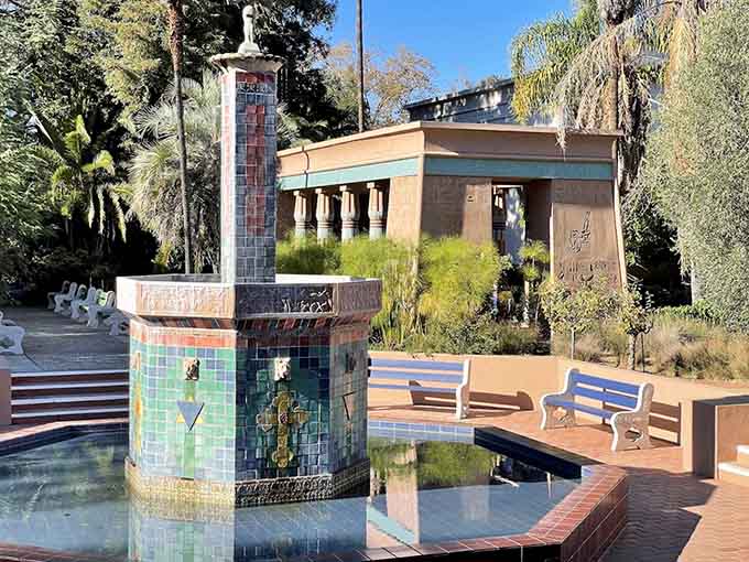 The mosaic fountain and Egyptian-style structures in the park grounds invite you to slow down and soak in every remarkable detail.