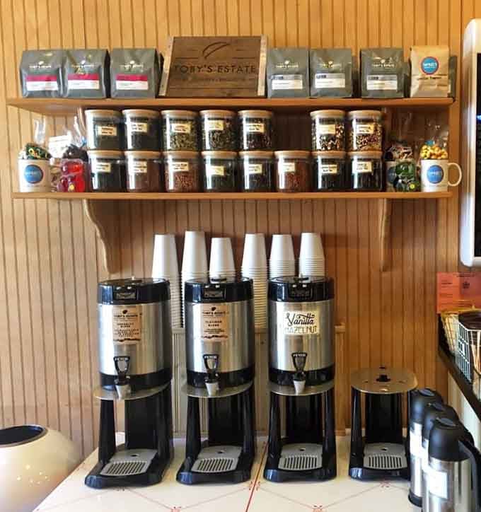 Toby's Estate coffee beans lined up on the shelf, proof that Samuel's takes its coffee just as seriously as its candy.