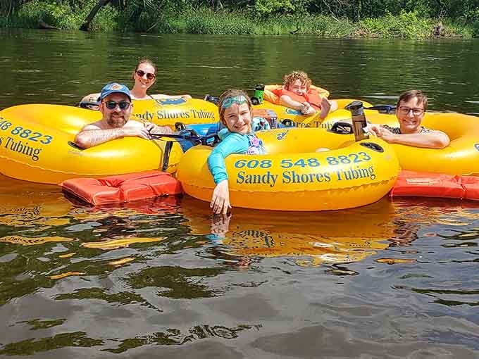 Four generations of smiles on one lazy river. Sandy Shores Tubing is basically a happiness delivery system.