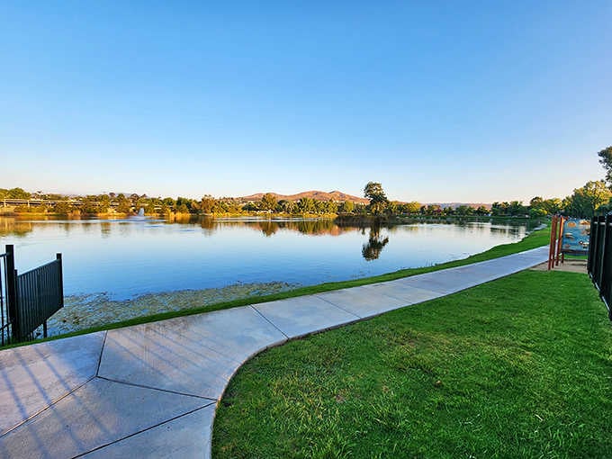 Golden hour bathes the walking path in warm light, making evening strolls feel like scenes from a romantic movie.