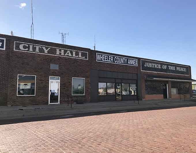 City Hall, Wheeler County Annex, and Justice of the Peace sharing one building is peak small-town Texas efficiency, and we love it.