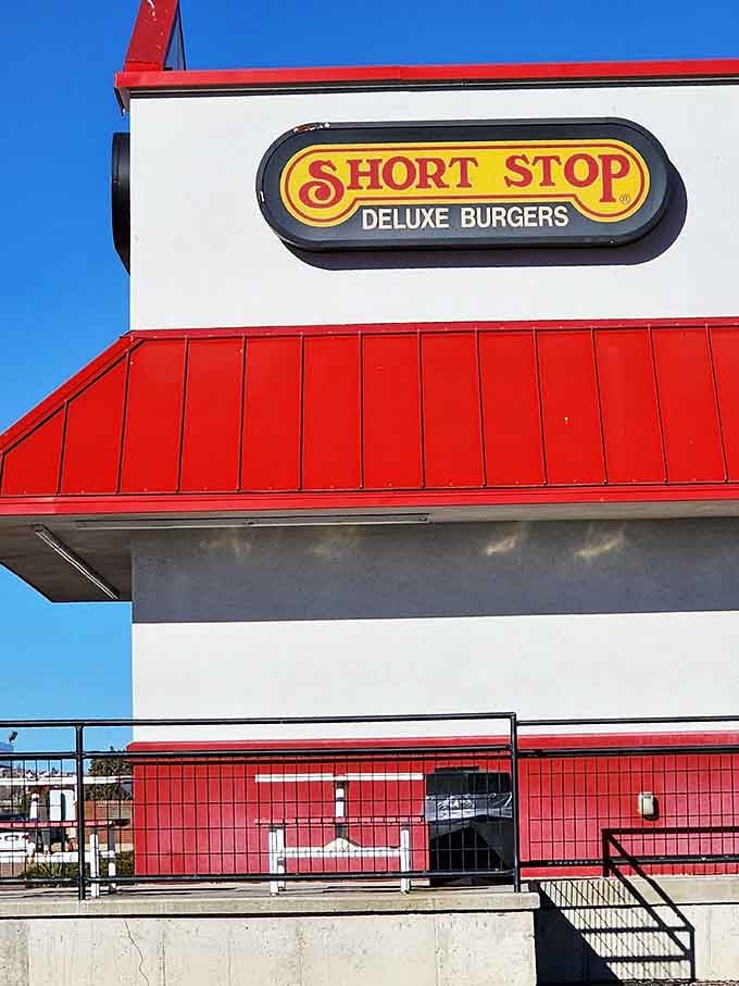 Short Stop Deluxe Burgers, right there on the sign against a perfect Colorado blue sky. No further explanation needed.