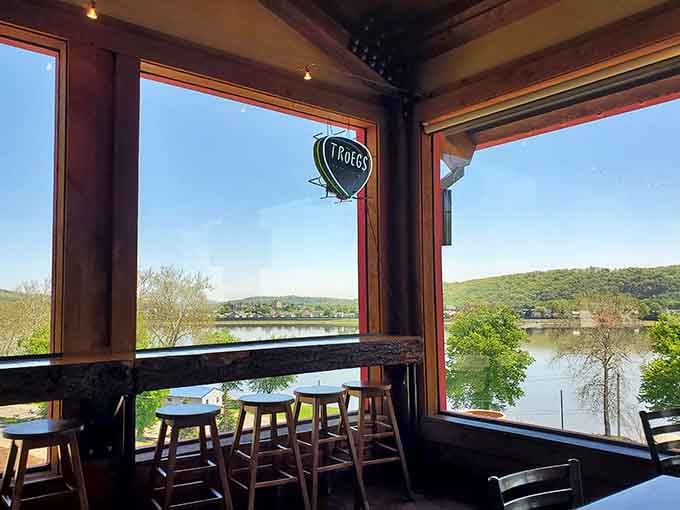 Warm wood, soft pendant lights, and river views waiting just beyond the glass, pure Pennsylvania magic.