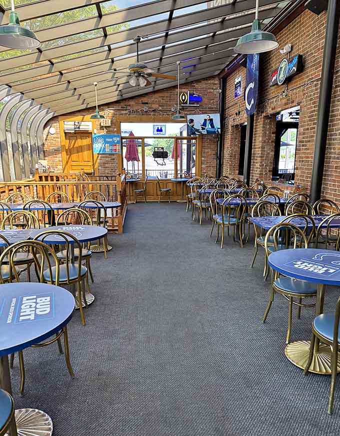 The glass-roofed dining room fills with afternoon light and the comfortable hum of people who have nowhere better to be.