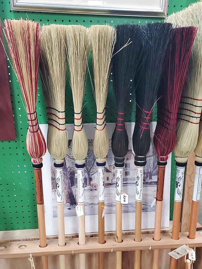 Handcrafted brooms in rainbow colors, because even cleaning supplies deserve to spark a little joy, Marie Kondo style.