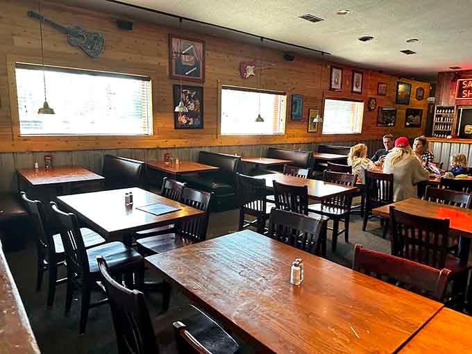 Music art on the walls, cozy booths, and families settling in for a serious meal together.