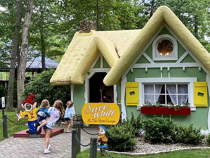 Snow White's cottage looks exactly like the storybook version, thatched roof and all, tucked perfectly among the trees.