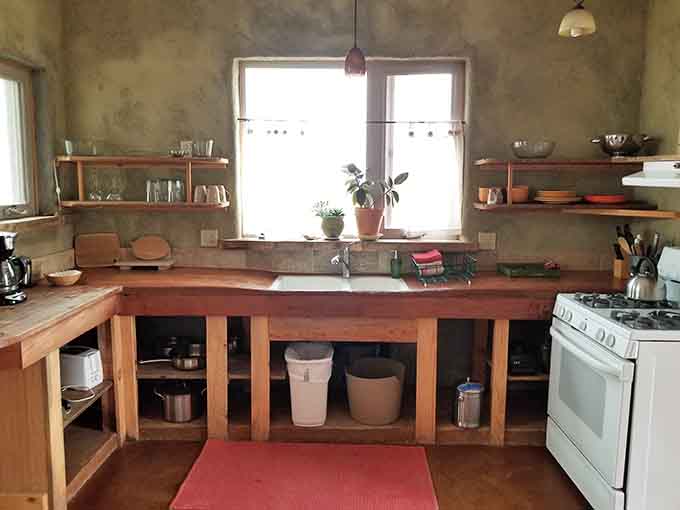 A kitchen that embraces the rustic life, because fancy appliances can't compete with hot springs outside your door.