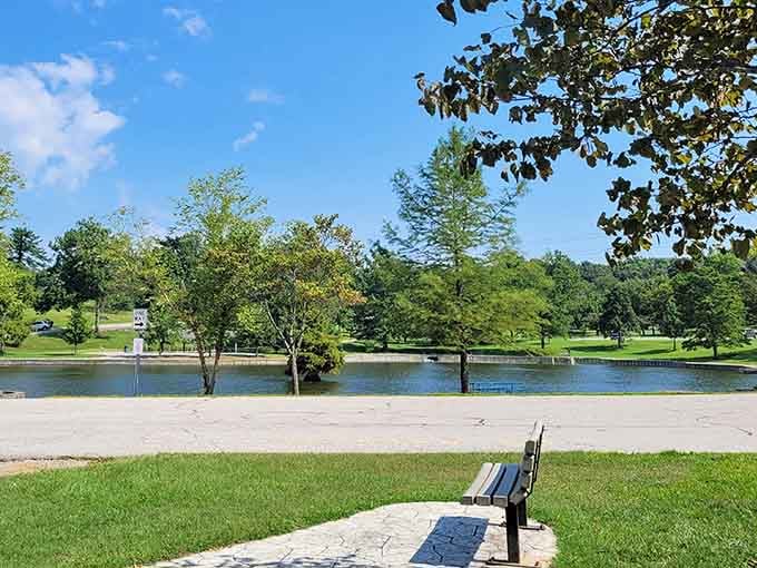 A quiet bench, a calm lake, and absolutely nowhere else you need to be right now.