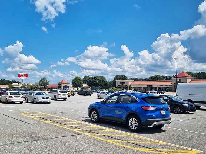 Blue skies, full parking lot, Tanger Outlets Commerce on a busy day is a beautiful sight.
