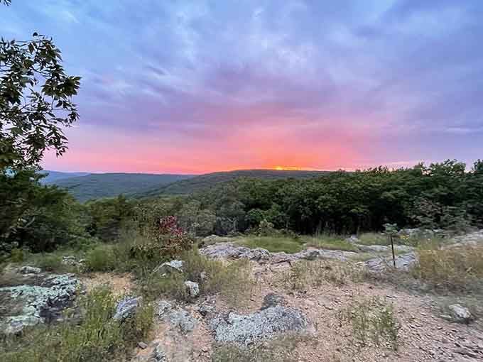 Sunsets from the summit look like someone spilled an entire box of watercolors across the Missouri sky.