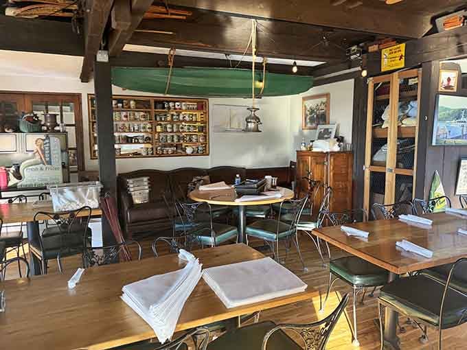 Sunlight streaming through windows illuminates tables waiting for diners who appreciate good food and better views.