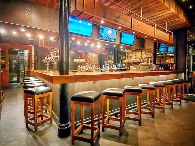 The bar stretches out like an invitation to settle in, order a drink, and watch the magic happen.