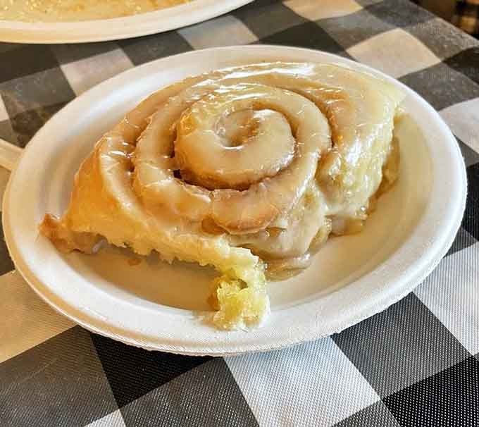 This cinnamon roll swimming in icing is larger than life and sweeter than your grandmother's compliments.