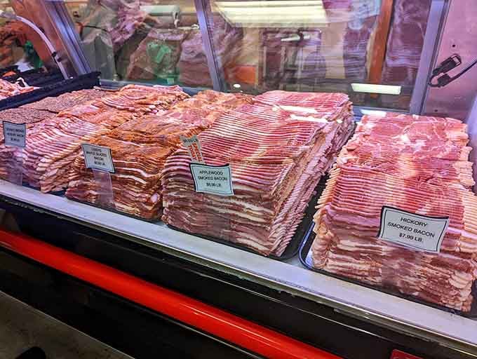 Applewood smoked, hickory smoked, and more. This bacon display is basically a love letter written entirely in pork.