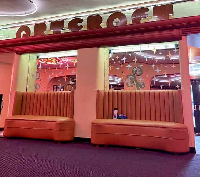 Those channeled leather booths under the "Cresroft" sign are where you wait in genuine style.