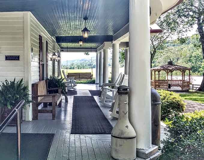 A porch with rocking chairs and mountain views. Waiting for a table has never looked this good.