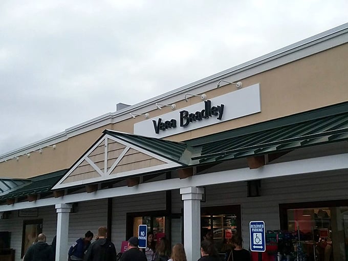 Vera Bradley's entrance beckons with patterns so cheerful they could brighten even the gloomiest rainy shopping day instantly.