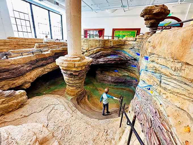 Real layered rock formations inside a museum, with a Goodnight Moon sign overhead — Missouri keeps surprising you if you let it.