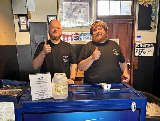 The friendly faces behind the counter have perfected the art of hot dog happiness over countless shifts.